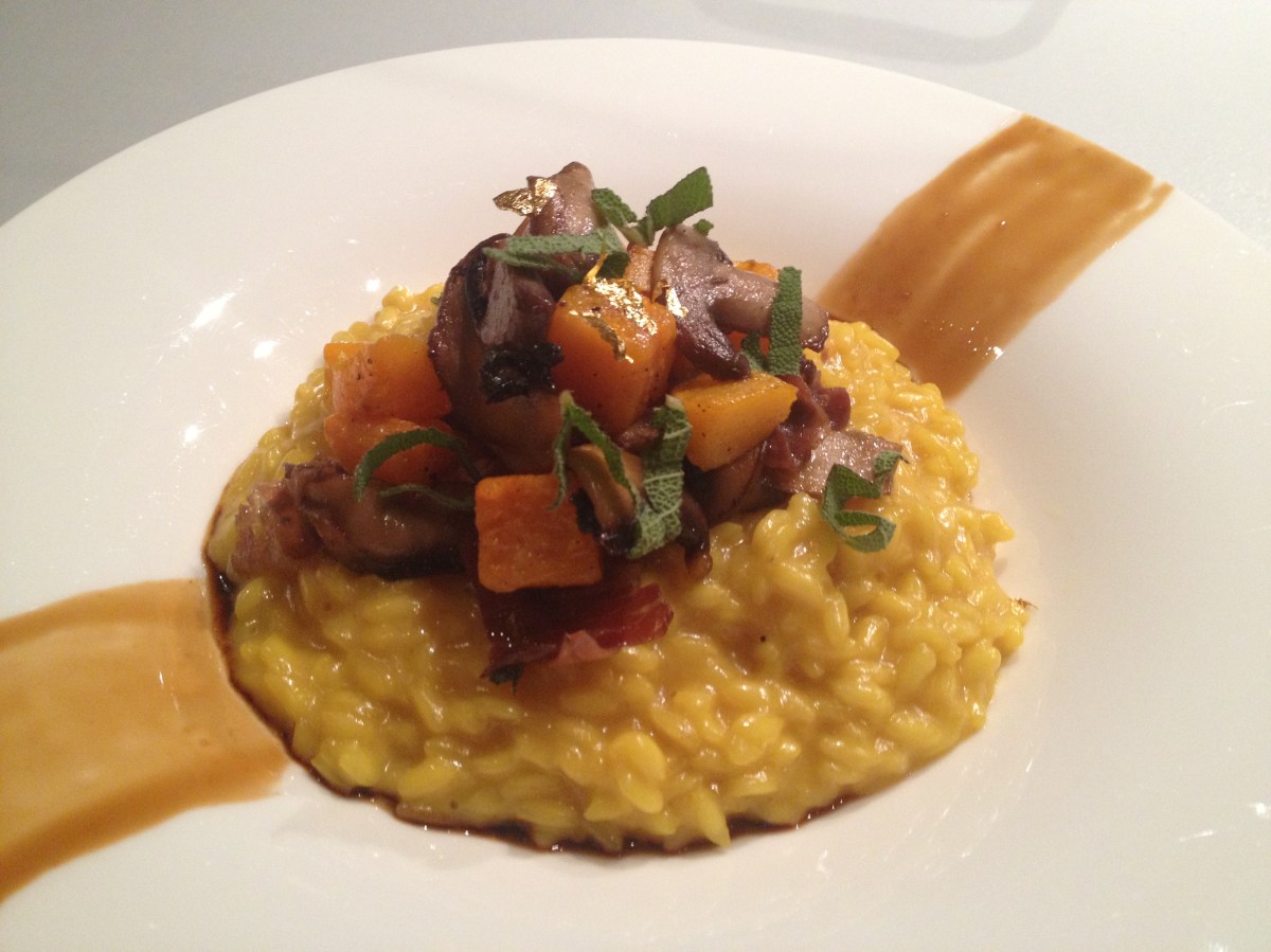 Saffron Risotto with a gathering of autumn flavours, edible gold leaf ...